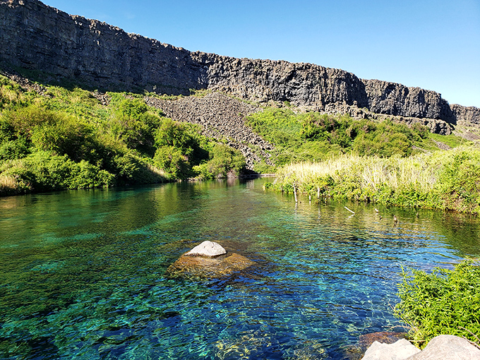 Box Canyon's impossibly blue waters reveal every pebble on the bottom. It's like someone dropped the Caribbean into Idaho.