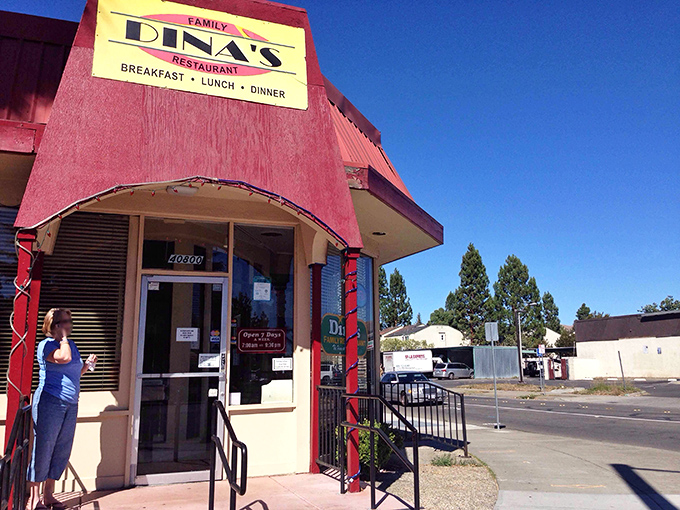 Dina's bright red exterior is like a cheerful hello, but it's the smell of fresh coffee and sizzling bacon that pulls you through the door.