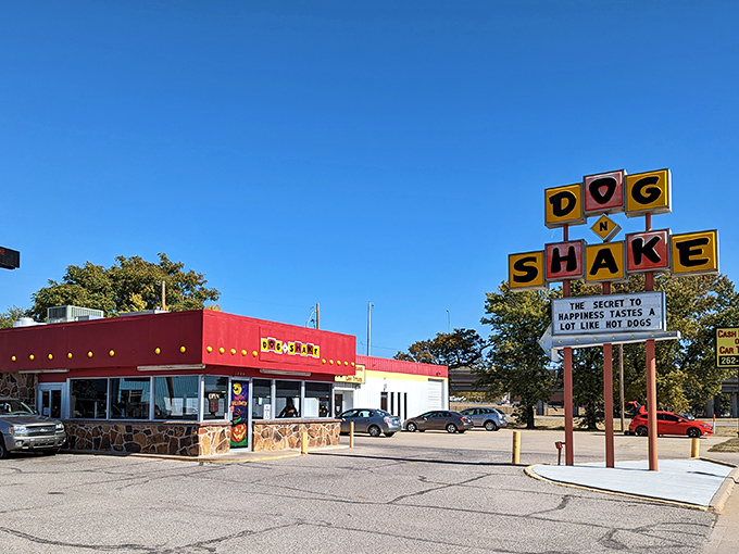 Dog-N-Shake's retro sign has been guiding hungry travelers for decades. Like a lighthouse, but for hot dog emergencies.