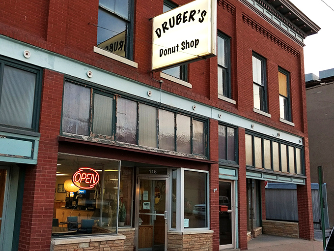 Druber's vintage sign hanging from classic red brick&mdash;like finding your grandma's secret recipe box in a modern kitchen. Timeless!