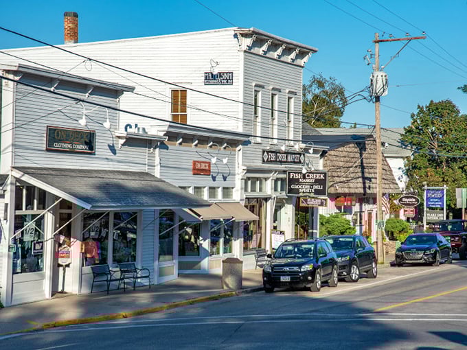 Fish Creek's main street has that perfect small-town vibe where you're never more than 30 seconds from either fudge or water views.