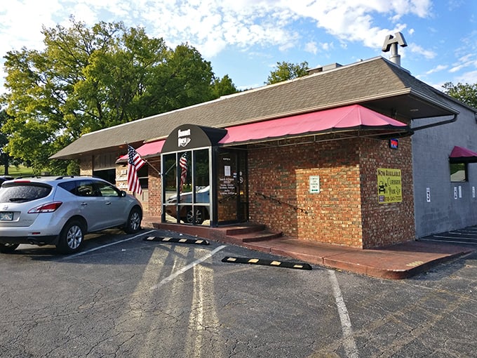 Hammett House's brick exterior and pink awning hint at the sweet comfort waiting inside &ndash; like a hug from your favorite grandma.