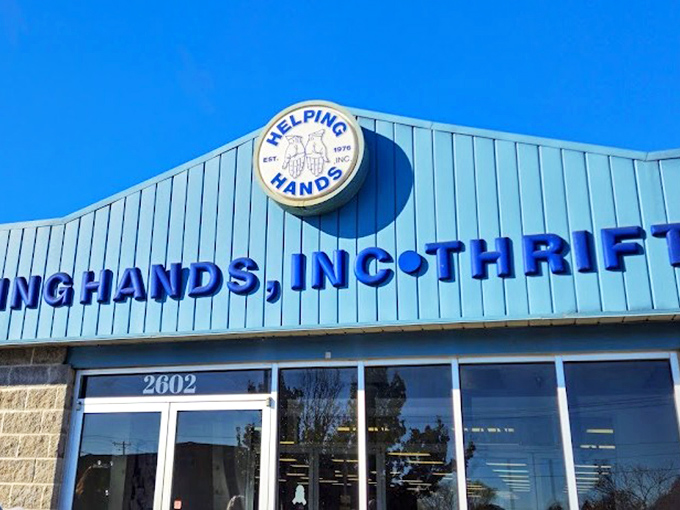 Helping Hands' cheerful blue exterior is like a beacon for bargain hunters. The Wonka Factory of thrift awaits inside!