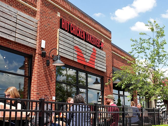 Hot Chicken Takeover's patio buzzes with happy diners experiencing Nashville heat in the heart of Columbus.