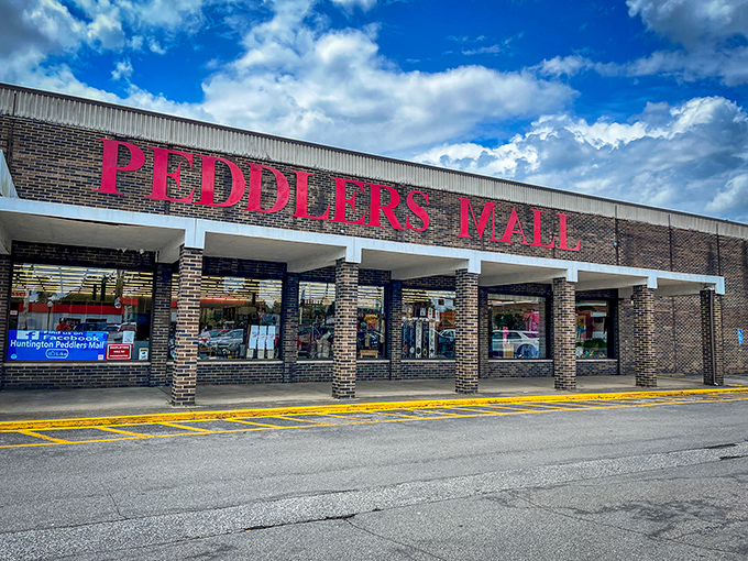 Red sign, big finds! Huntington's Peddlers Mall welcomes shoppers to a brick-and-mortar treasure trove where every booth tells a different story.