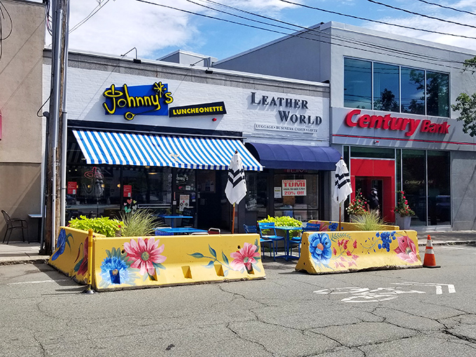 Johnny's blue and yellow exterior pops with the same vibrant energy as the breakfast creations waiting inside.