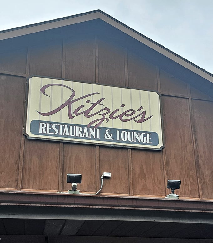 Kitzie's sign: "Sometimes the best treasures come in humble packages. Kitzie's proves you can't judge a seafood feast by its cover."