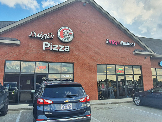 Luigi's might share space with a fashion store, but make no mistake &ndash; their pizza is the real style statement in this strip mall.