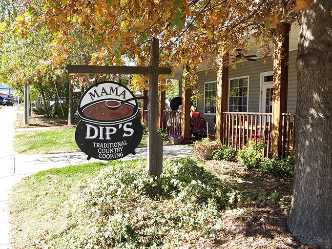 Mama Dip's quaint sign and wooden porch promise home cooking that delivers. This is southern comfort on a plate, no therapy session required.