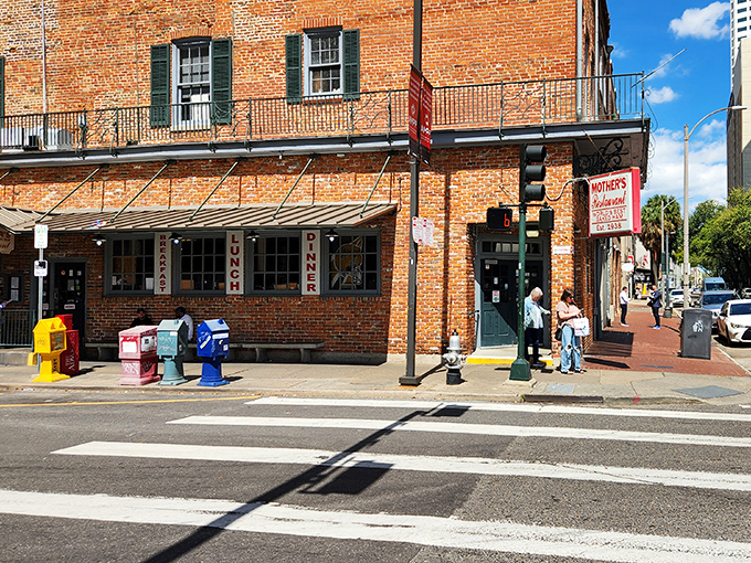 The historic brick exterior of Mother's has weathered hurricanes and hangovers, standing strong like its legendary biscuits.
