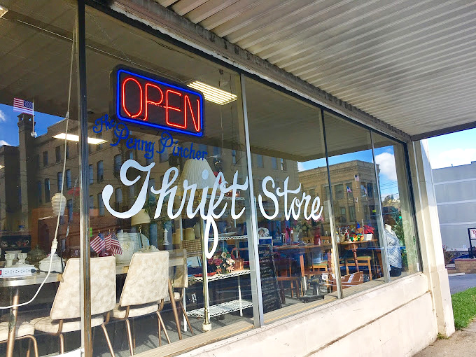 Penny Pincher: "Organized chaos of treasures! Those pegboard walls hold everything from vintage handbags to kitchen gadgets you forgot existed."