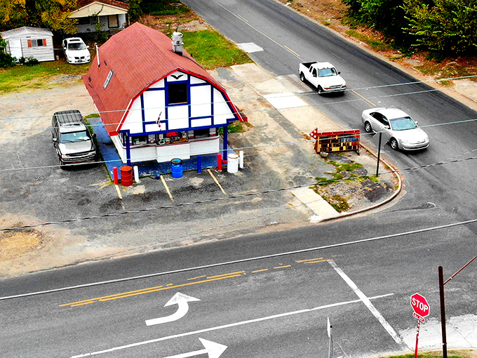 The Burger Barn's distinctive red-roofed silhouette &ndash; like a burger cathedral where motorcycle pilgrims come to worship at the altar of beef.