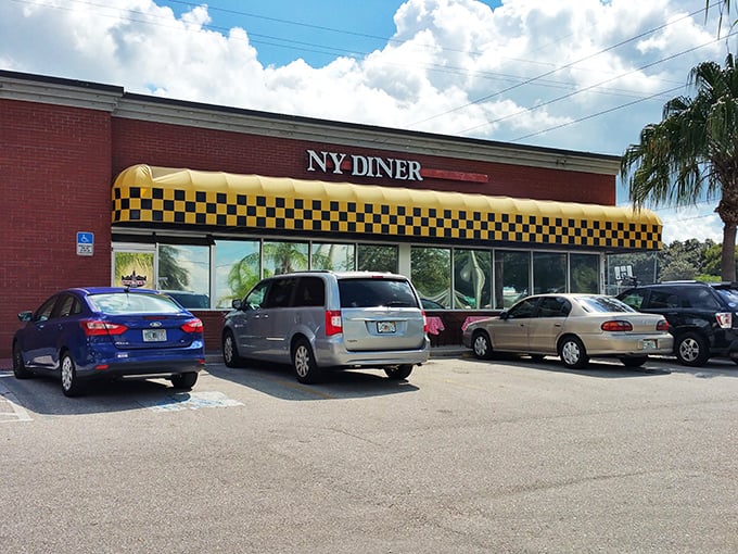 The New York Diner's bold yellow and black checkerboard awning &ndash; bringing a taste of Manhattan attitude to Valrico strip malls.