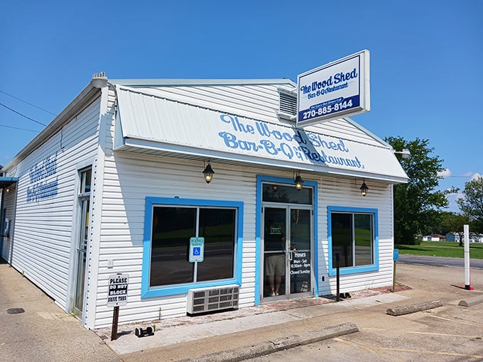 The Woodshed's crisp white-and-blue exterior could fool you&mdash;until that BBQ aroma hits. Like finding a beach cottage that serves heavenly smoke instead of seafood!