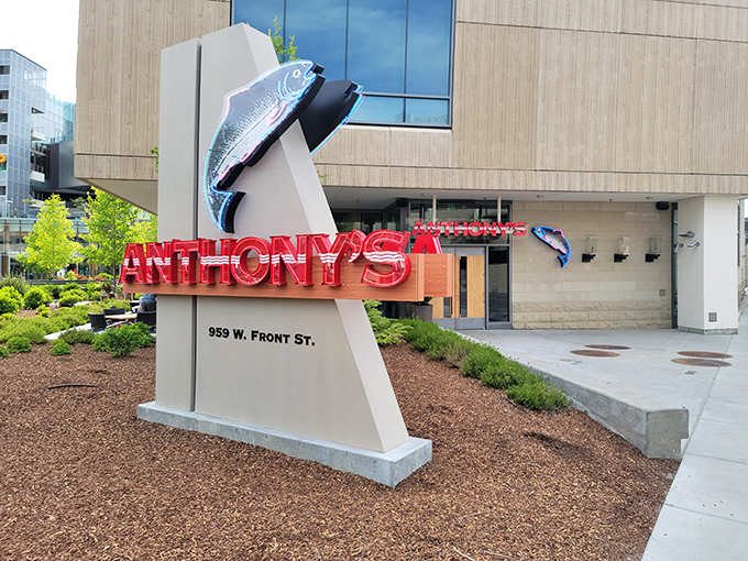 Modern lines meet seafood tradition at Anthony's. That architectural fish isn't just decoration&mdash;it's a promise of ocean freshness.