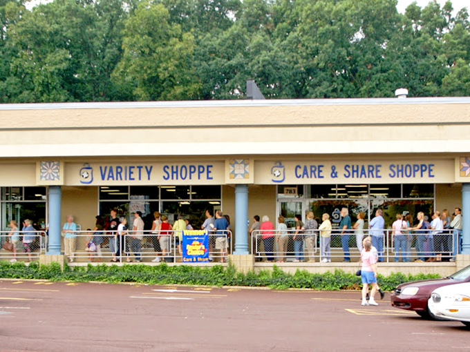 The daytime crowd outside Care & Share proves the universal truth: everyone loves a good deal!