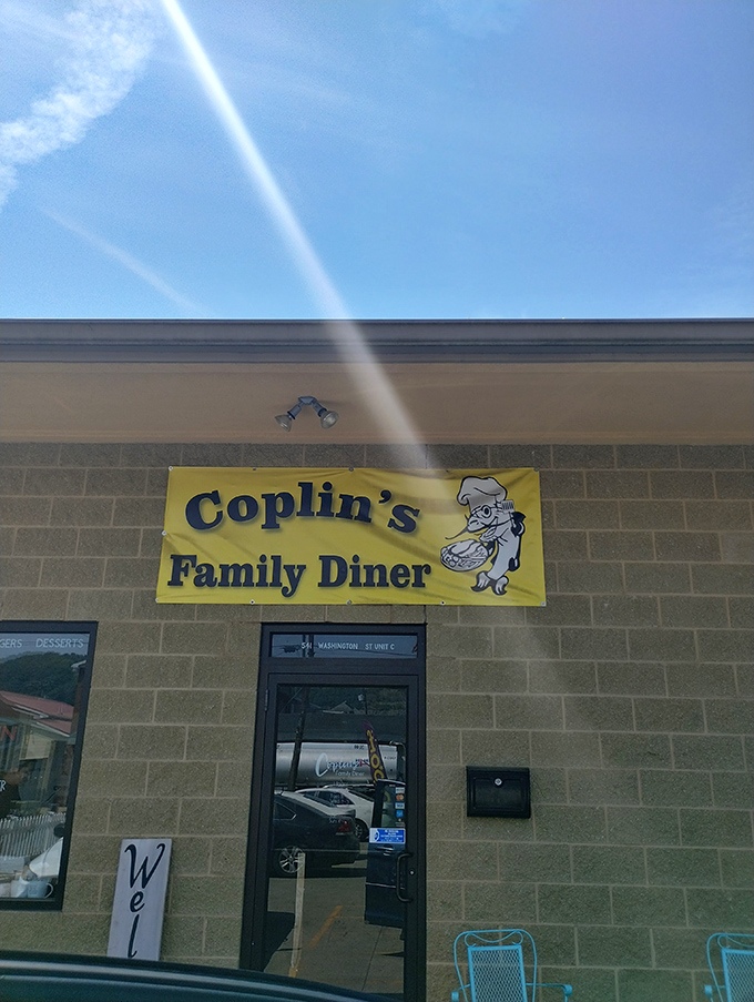 Sunlight creates a heavenly glow around Coplin's sign—appropriate for a place that serves divinely inspired comfort food.