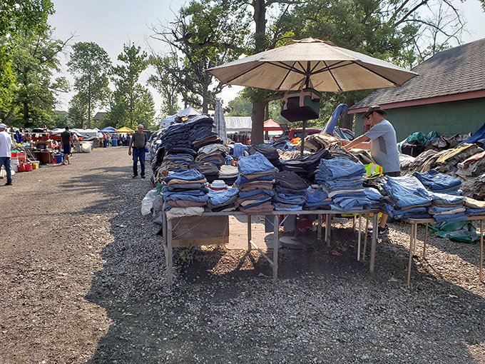Tables piled high with denim at Greenlawn Grove&mdash;Michigan's unofficial uniform at unbeatable prices. Blue jean heaven under blue skies!