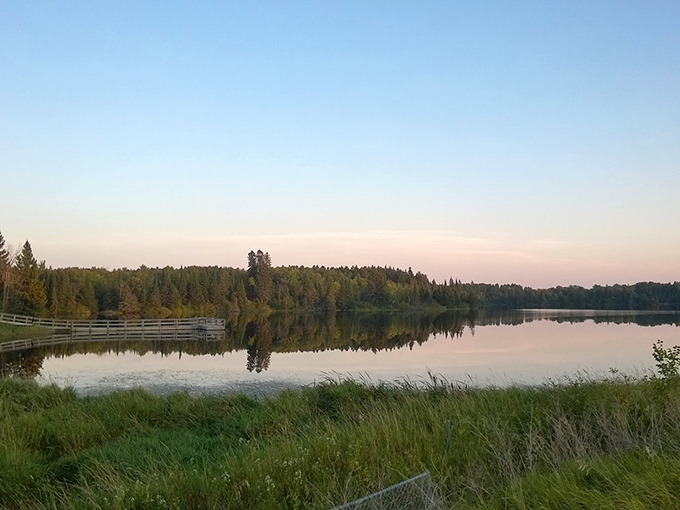 Sunset paints Hayes Lake in watercolor hues, turning an ordinary Minnesota evening into a masterpiece worth framing.