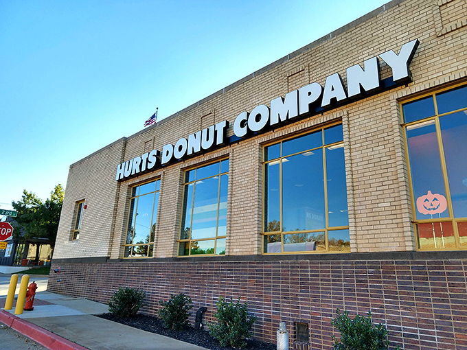 Architectural simplicity hiding culinary genius. Hurts Donut Company proves great things come in unassuming brick packages.