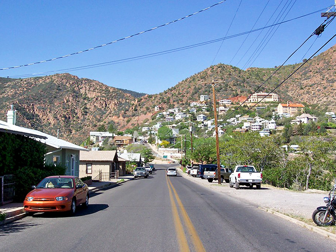 The "Wickedest Town in the West" now welcomes visitors with artistic flair and spectacular views from its precarious perch.