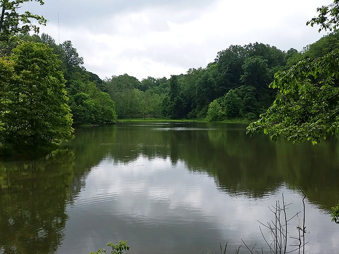 Fishing on the serene waters of Audubon State Park – where catching nothing still feels like winning everything.