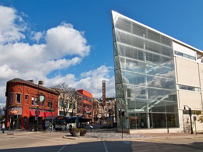 The modern glass buildings alongside historic brick structures in Madison create a city where culture and affordability haven't yet divorced.