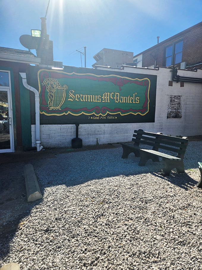 That colorful sign and weathered bench outside Seamus McDaniel's tell a story of a place where locals gather and great burgers happen.