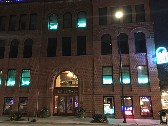 By night, Splash transforms into an aquatic oasis of culinary delights, its windows glowing like bioluminescent sea creatures.