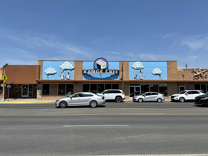 Those cloud-riding cows on The Range Cafe's exterior aren't just cute - they're a promise of blue corn heaven inside.