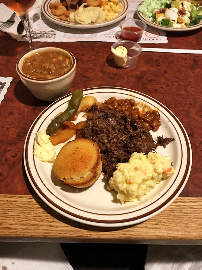 The perfect Kentucky plate: slow-smoked mutton, homestyle sides, and that legendary burgoo. This isn't a meal; it's a cultural experience with gravy.