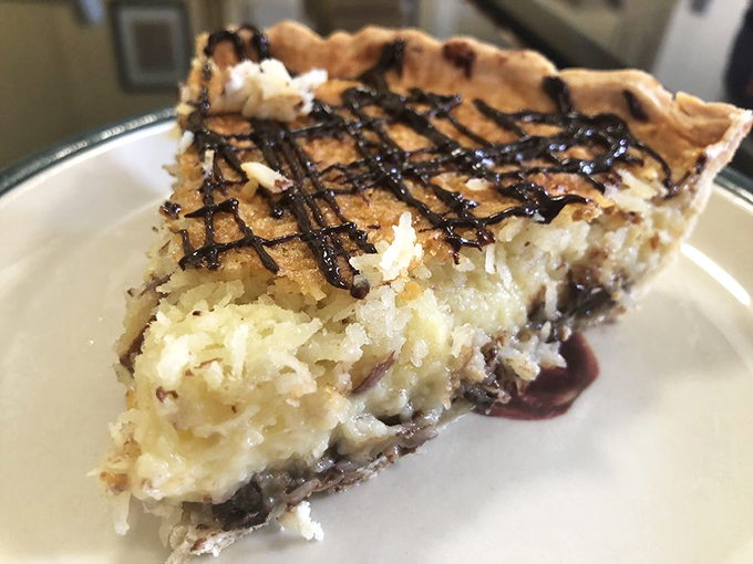 Chocolate drizzle creating a crosshatch of joy atop coconut&mdash;proof that sometimes the best relationships are the sweetest ones. 