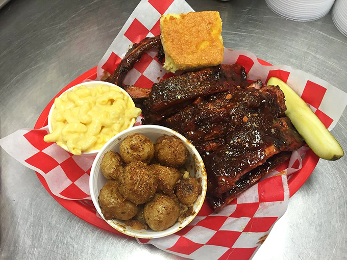 Not all heroes wear capes. Some come on red checkered paper with cornbread, mac and cheese, and potatoes worthy of worship.