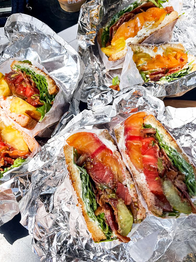 Sandwich perfection in triplicate. These BLTs aren't just lunch&mdash;they're edible sunshine wrapped in foil. 