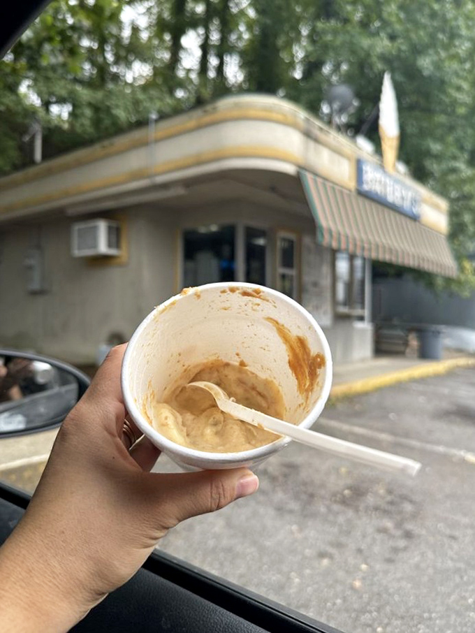 Evidence that happiness can be found at the bottom of an empty cup - the sweet remains of what was clearly worth every calorie.