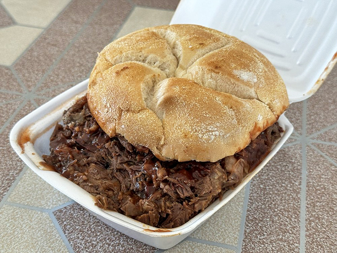 Beef meets bun in perfect harmony. This brisket sandwich isn't just lunch&mdash;it's a meditation on what happens when smoke meets meat meets time.