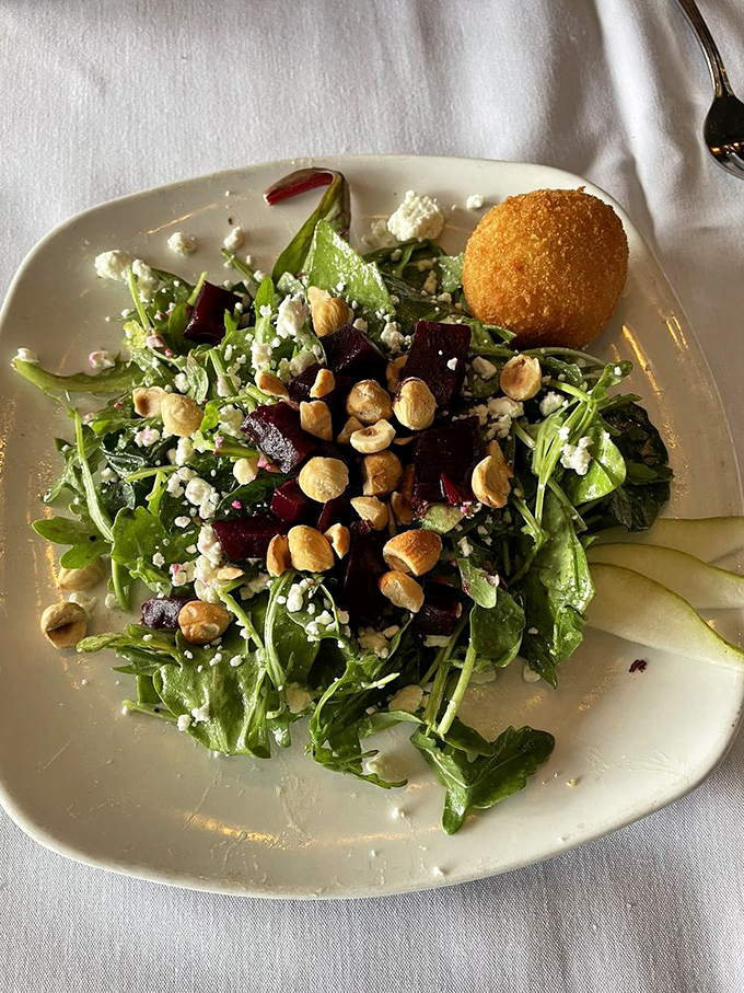 This isn't just a salad&mdash;it's a colorful rebellion against boring lunch options, complete with a golden-fried surprise on the side.