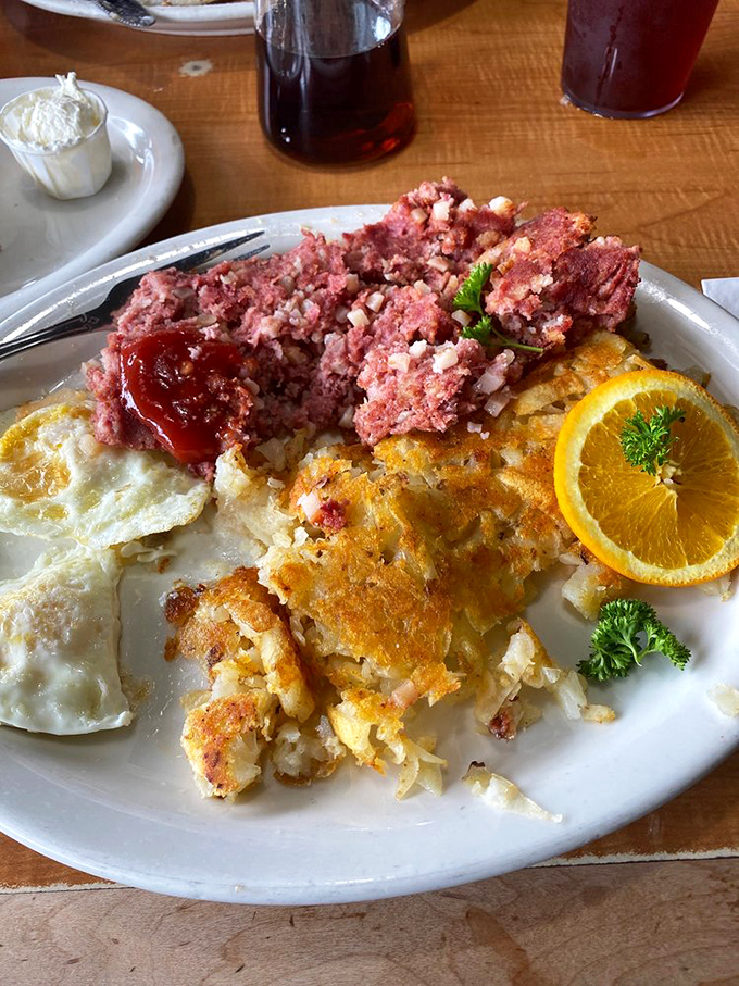 This isn't your sad canned hash &ndash; chunks of house-prepared corned beef mingle with potatoes in a crispy-edged dance of breakfast perfection.