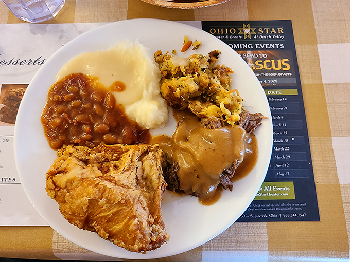 Behold the holy trinity of Amish cooking: golden fried chicken, cloud-like mashed potatoes, and green beans that actually taste like vegetables.