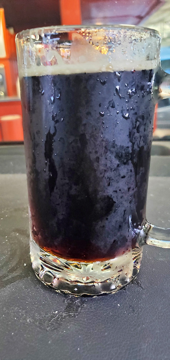 Liquid amber perfection in a frosted mug. That first sip of Stewart's root beer is like tasting a fizzy, sassafras-infused time machine to simpler days.