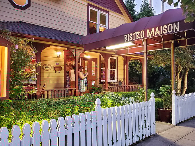 Bistro Maison's cottage setting feels like dining at your fancy French aunt's home. That white picket fence keeps the calories in, not out. P