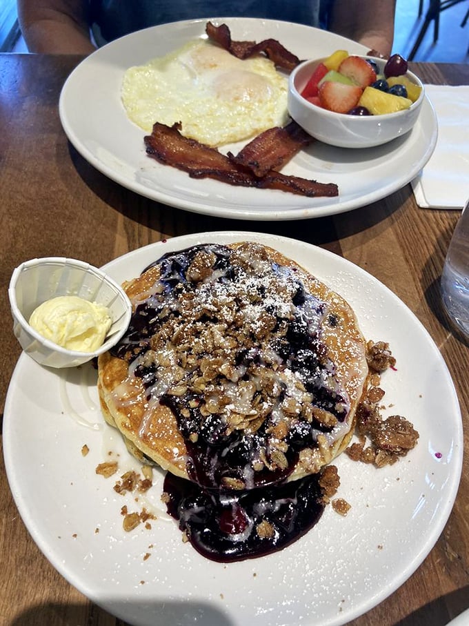 Blueberry pancakes with a cascade of compote that makes you wonder if fruit should always be served in liquid form. 
