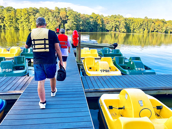 The paddle boat dock&mdash;your gateway to cypress adventures. Those yellow vessels aren't winning any beauty contests, but they'll show you magic.