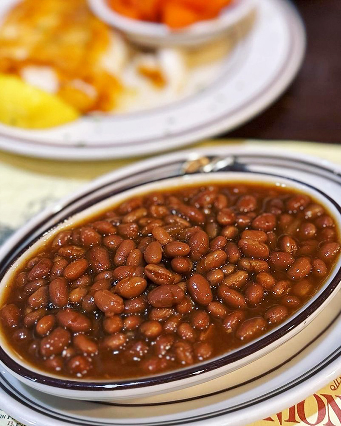 Boston baked beans &ndash; slowly simmered to perfection in what must be the culinary equivalent of a Red Sox game: traditional, satisfying, and quintessentially Massachusetts.