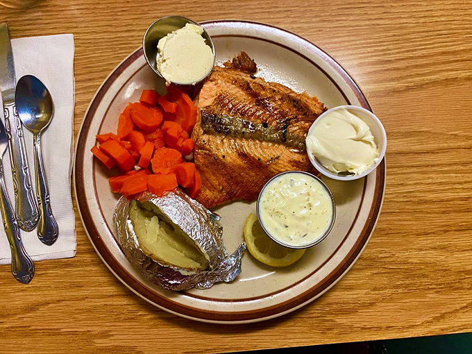 The salmon arrives golden-brown with sides neatly arranged &ndash; a plate that says "we care about details" without needing to shout it.