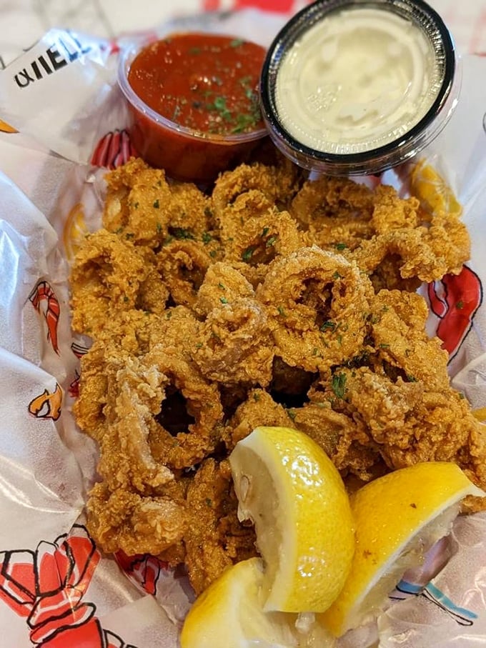 Calamari so perfectly golden and crispy, it makes you wonder if the chef has a PhD in deep-frying arts.