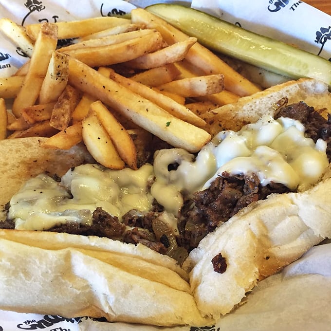 Golden, crispy fries flank a cheesesteak so authentic you'll check your GPS to confirm you haven't been teleported to South Philly.