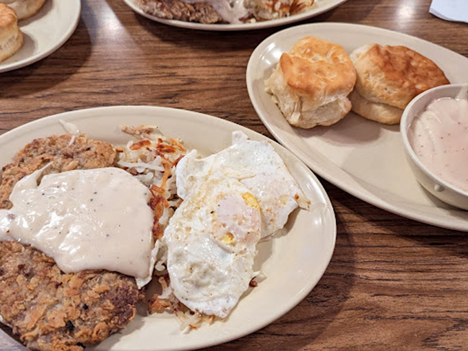 Breakfast of champions: chicken-fried steak crowned with pepper-speckled gravy alongside eggs and hash browns that glisten with flat-top perfection.