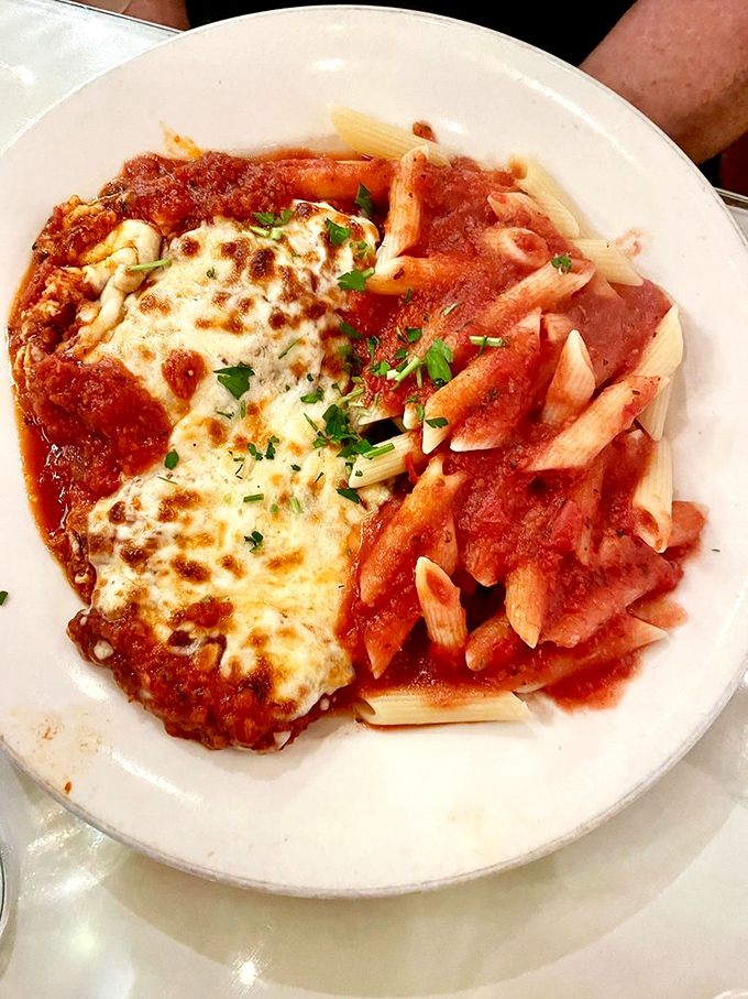 Chicken parmigiana with penne&mdash;proof that sometimes the best relationships are the classic ones that never go out of style.