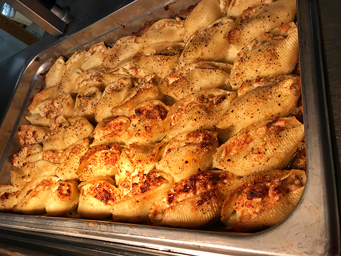 Stuffed pasta shells, the culinary equivalent of a warm hug from someone who genuinely likes you. Cheese stretches toward infinity, beckoning forks from across the room.